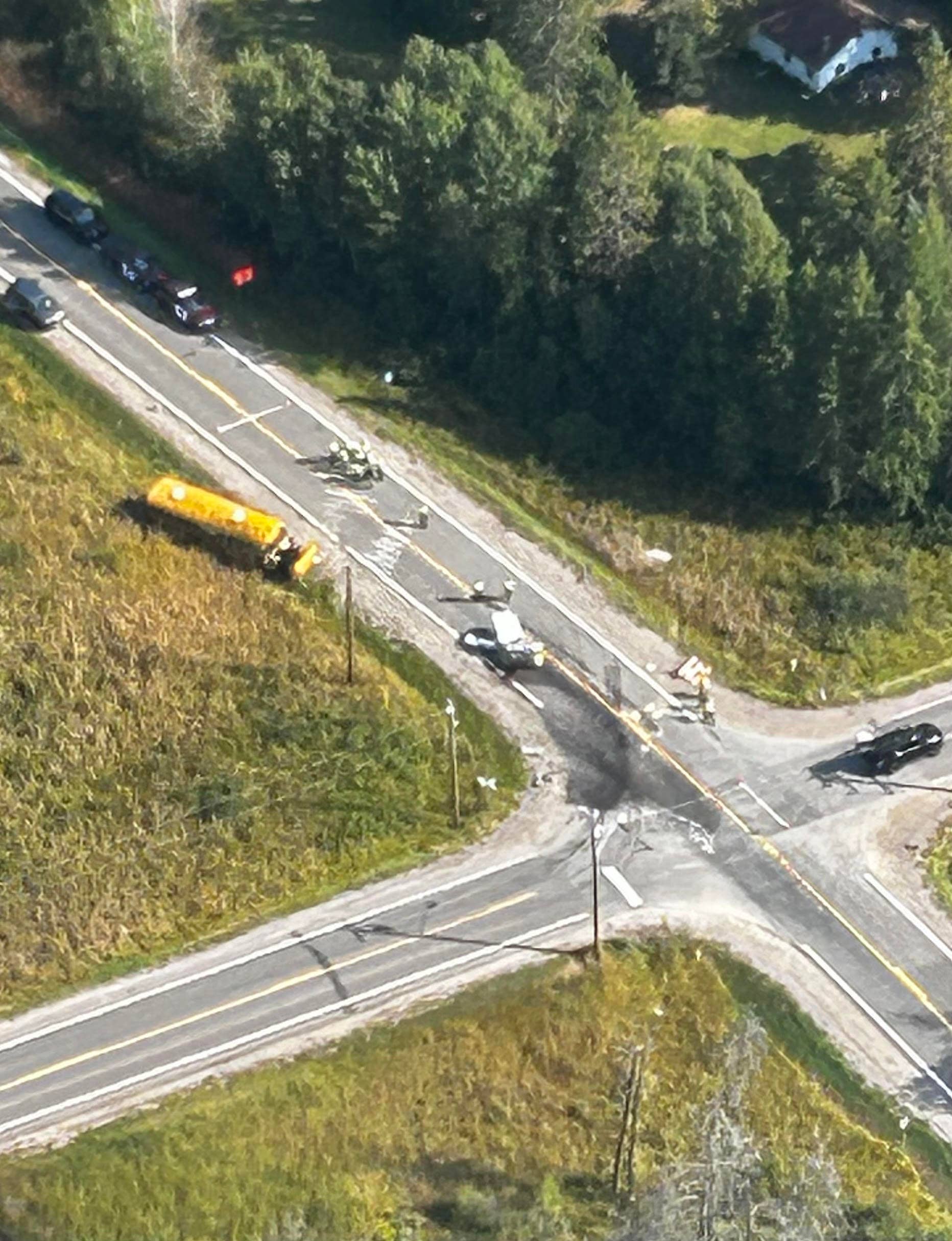 Driver pleads guilty to crashing into school bus, injuring 22 near ...