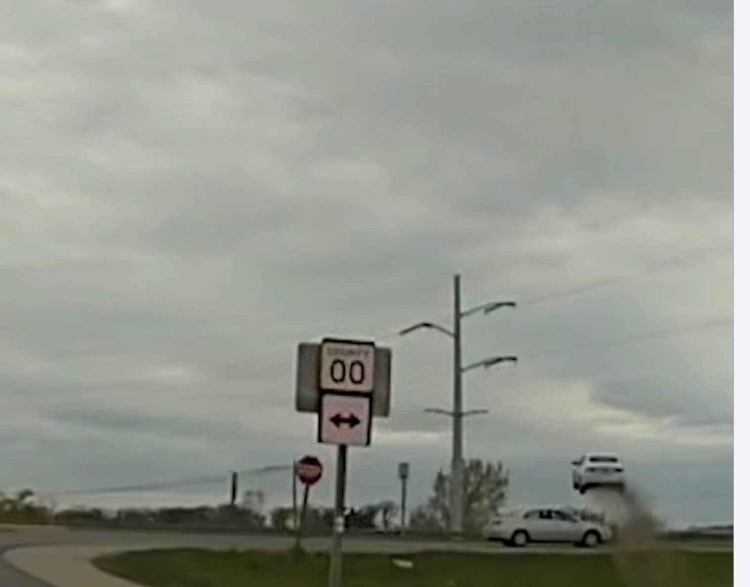 Watch: Remarkable moment driver goes airborne, leaps over car during ...