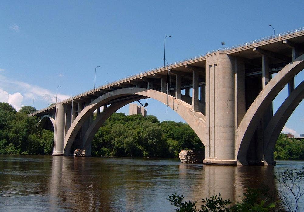 Woman in 'serious condition' after falling from Franklin Avenue Bridge ...