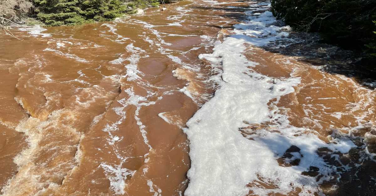 Raging North Shore rivers wipe out bridges, trees - Bring Me The News