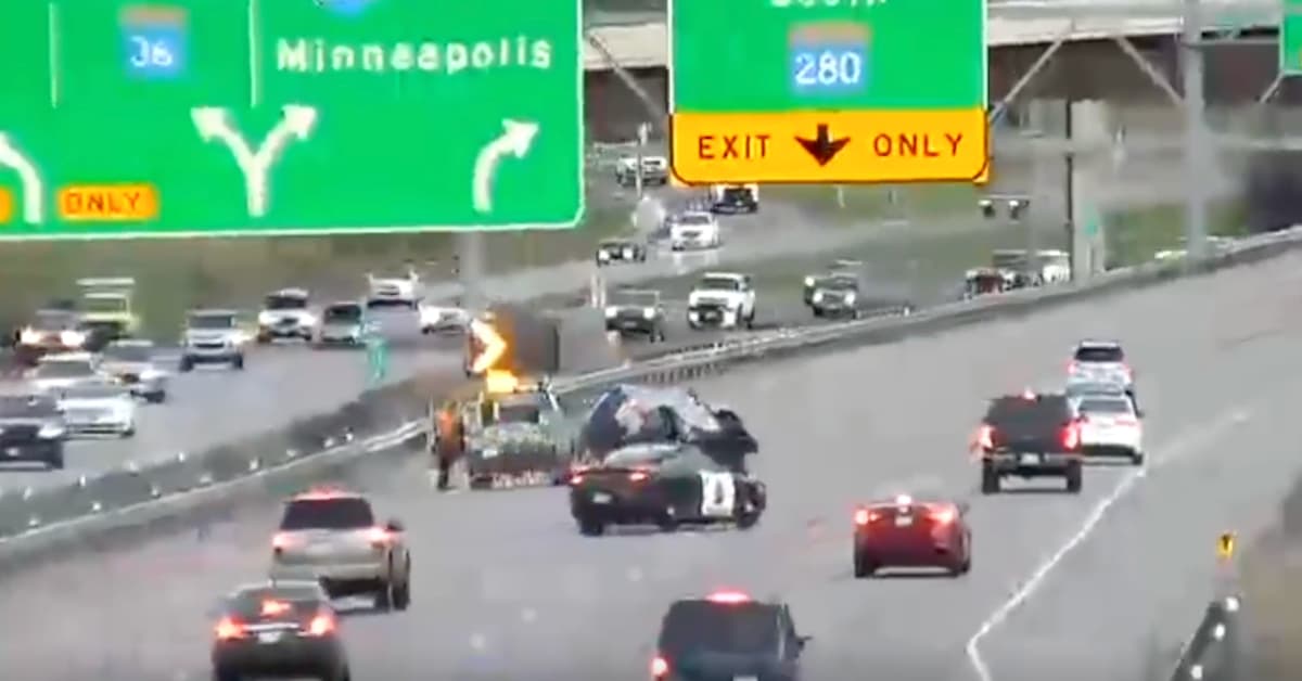 Watch: Officer nearly flips over Hummer on I-35W - Bring Me The News