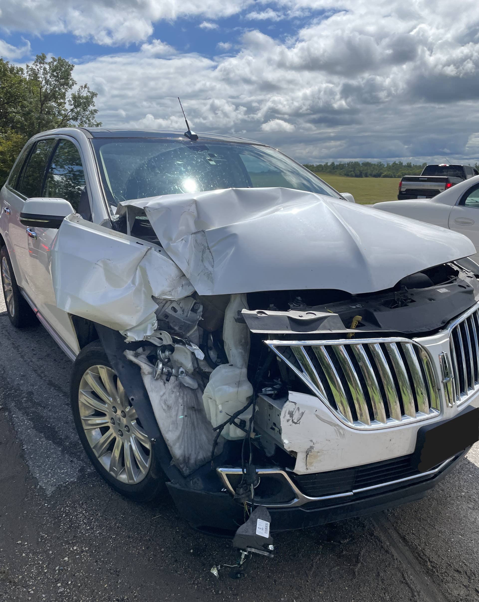 SUV collides with trailer, boat left in ditch after driver hit ...