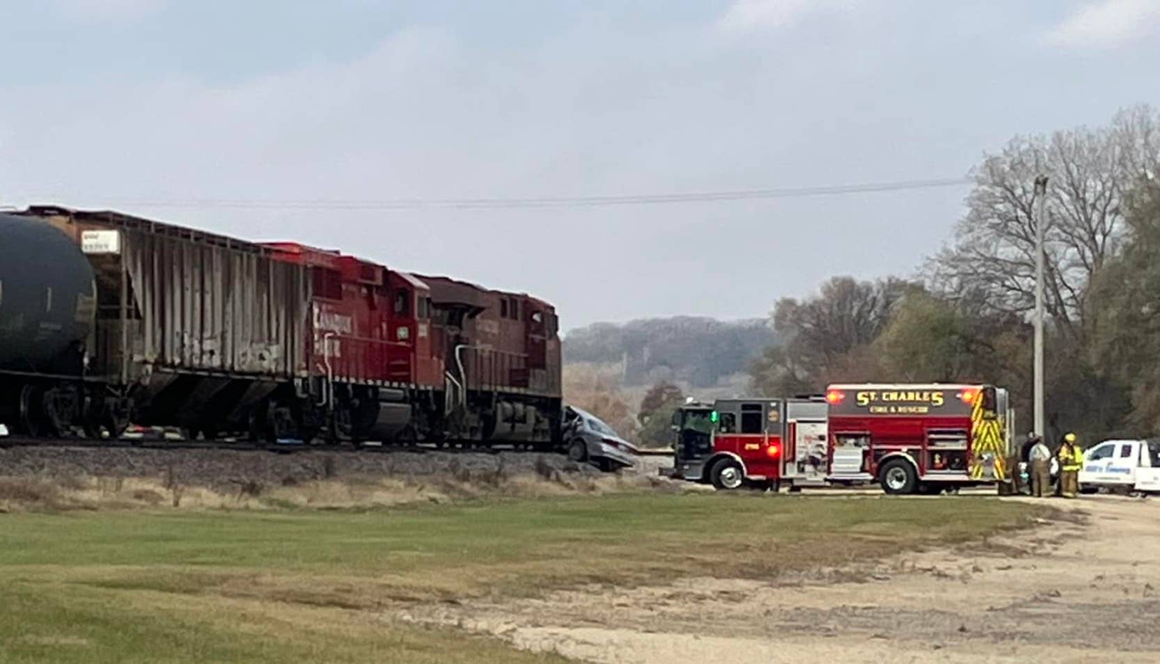 Freight train collides with car at crossing in St. Charles - Bring Me ...