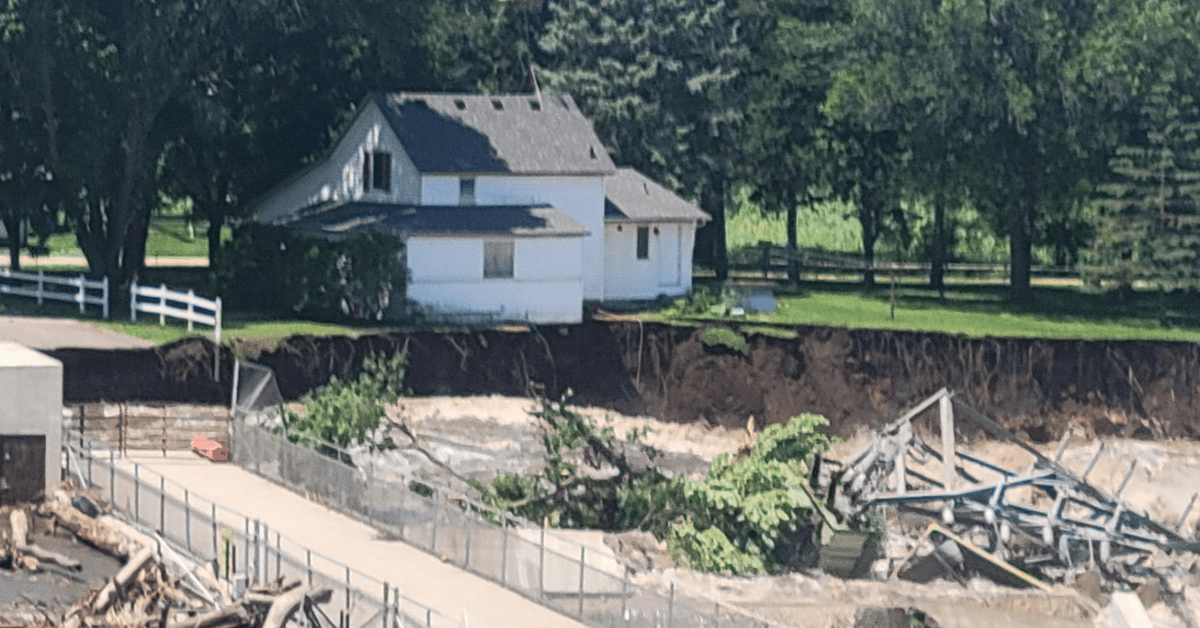 Watch: Home collapses into Blue Earth River at roaring Rapidan Dam - Bring Me The News