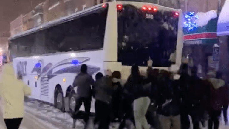 Delano boys hockey team pushes its own bus out of the snow - Bring Me ...