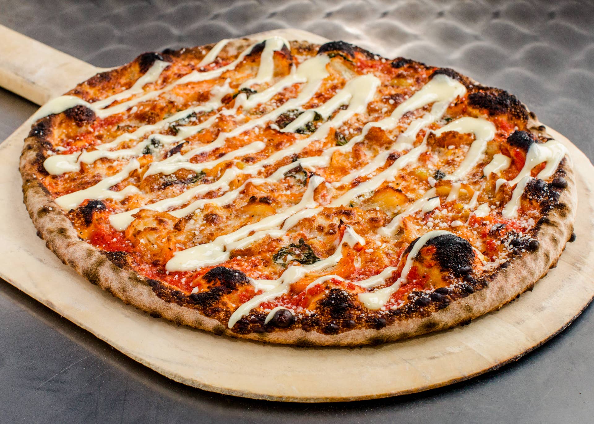 New Haven-style pizzeria OG Zaza to open inside St. Paul distillery ...