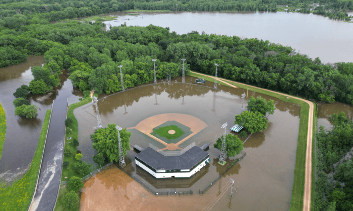Chaska's Athletic Park intentionally flooded to protect local property ...