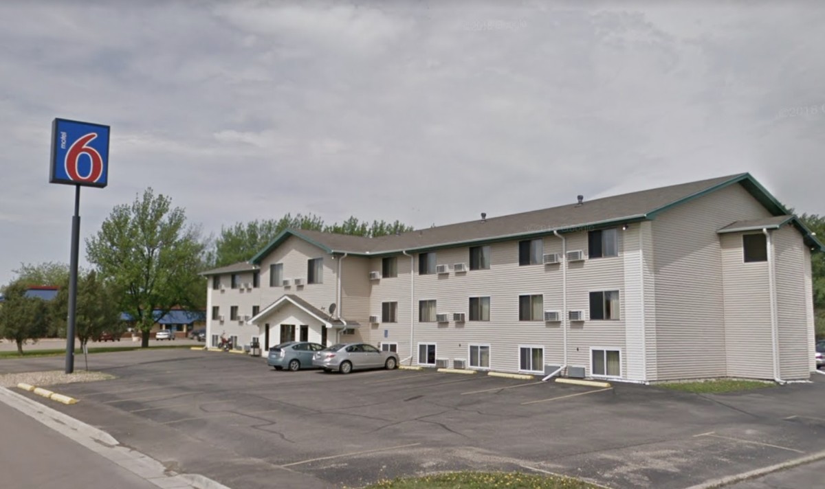 Woman arrested after shots were fired into hotel room door in Albert ...