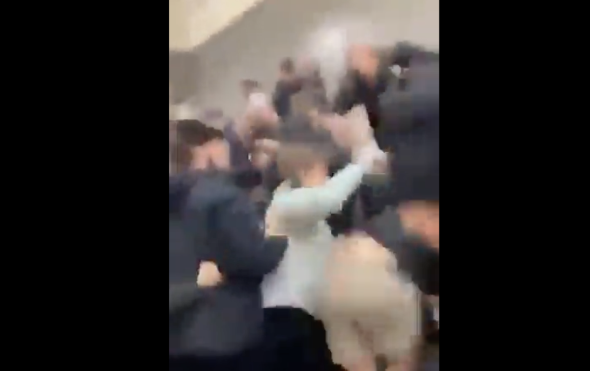 Video shows fight break out between man, students during playoff hockey ...