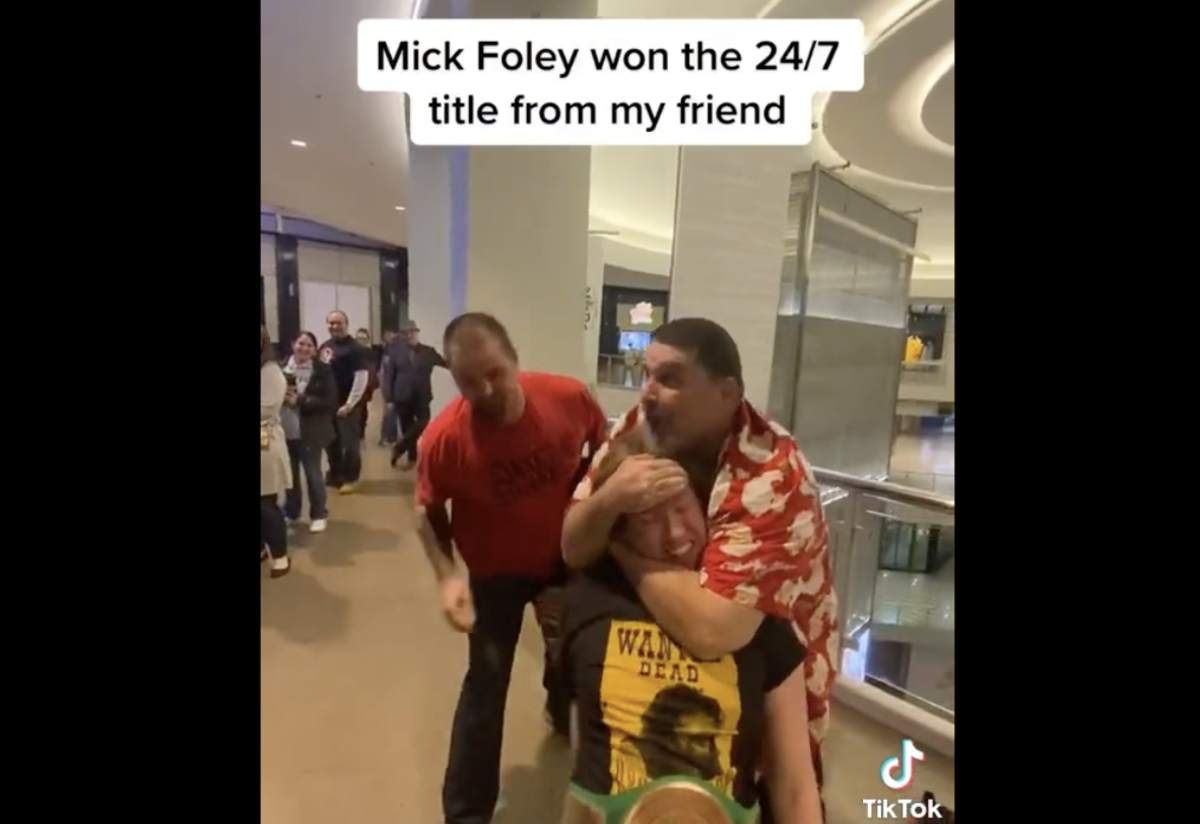 Watch: Wrestling legend Mick Foley puts sleeper on fan at Mall of ...