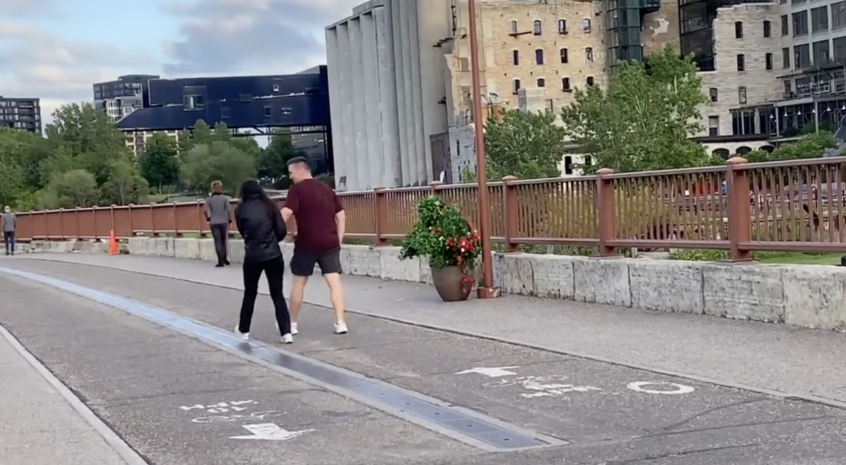 Watch: Someone in plant disguise jumps out at people on Stone Arch ...