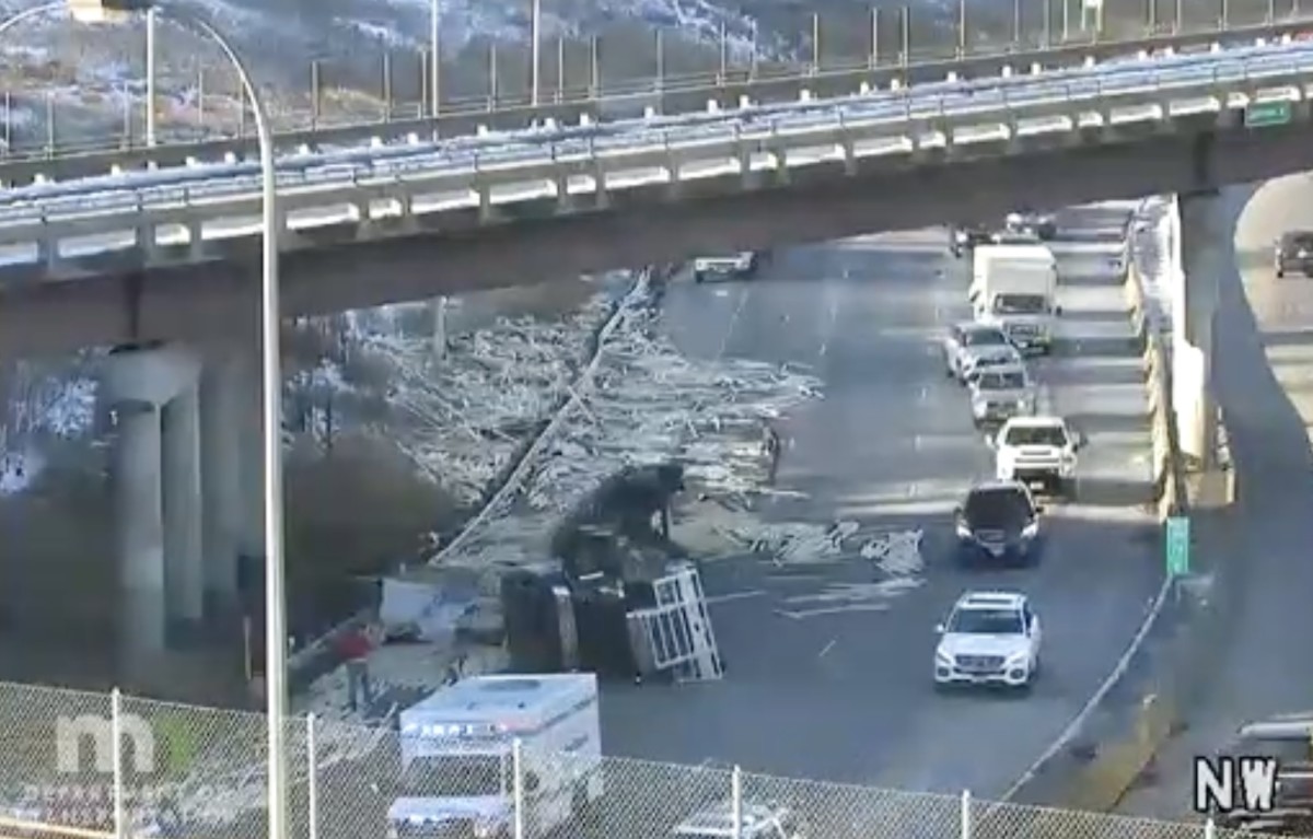 Watch: Semi-trailer crashes on I-35W, spilling load across freeway ...