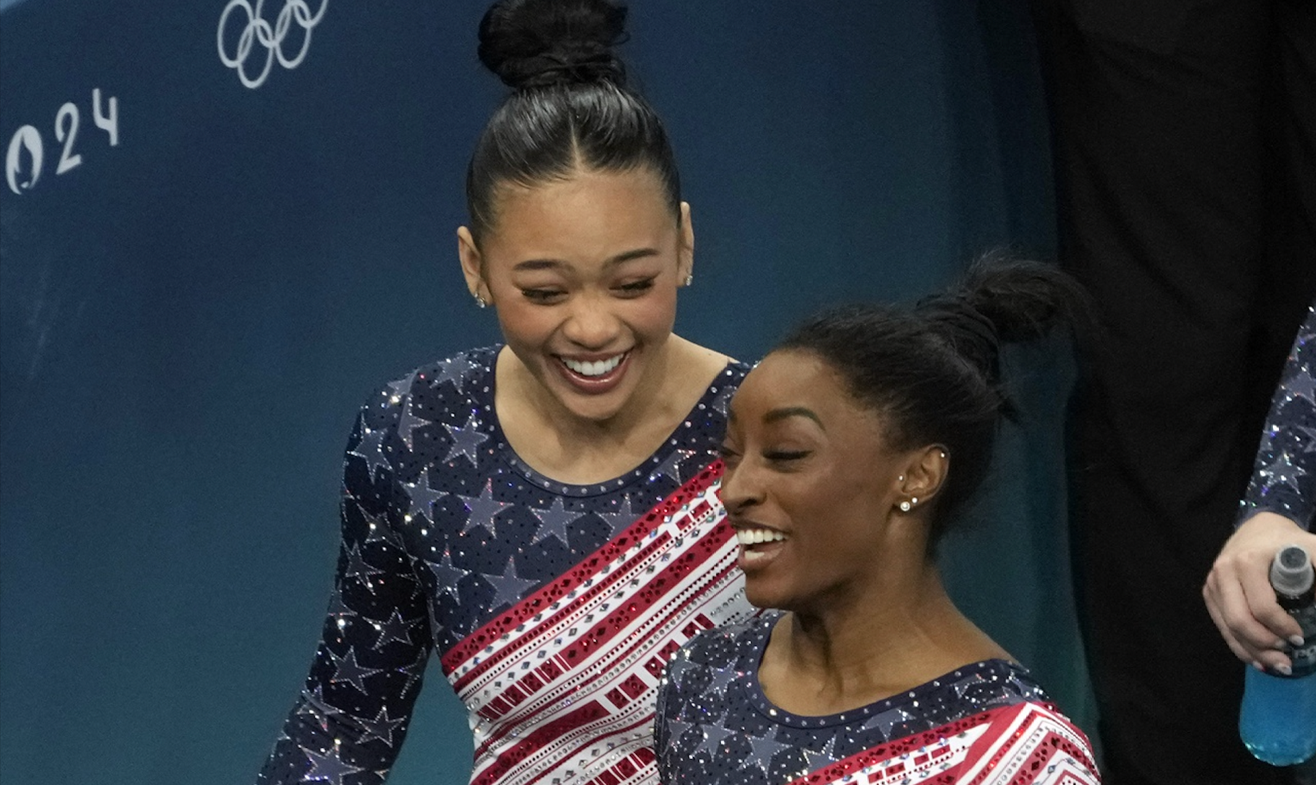 Suni Lee recovers from scary practice fall to smash her uneven bars ...