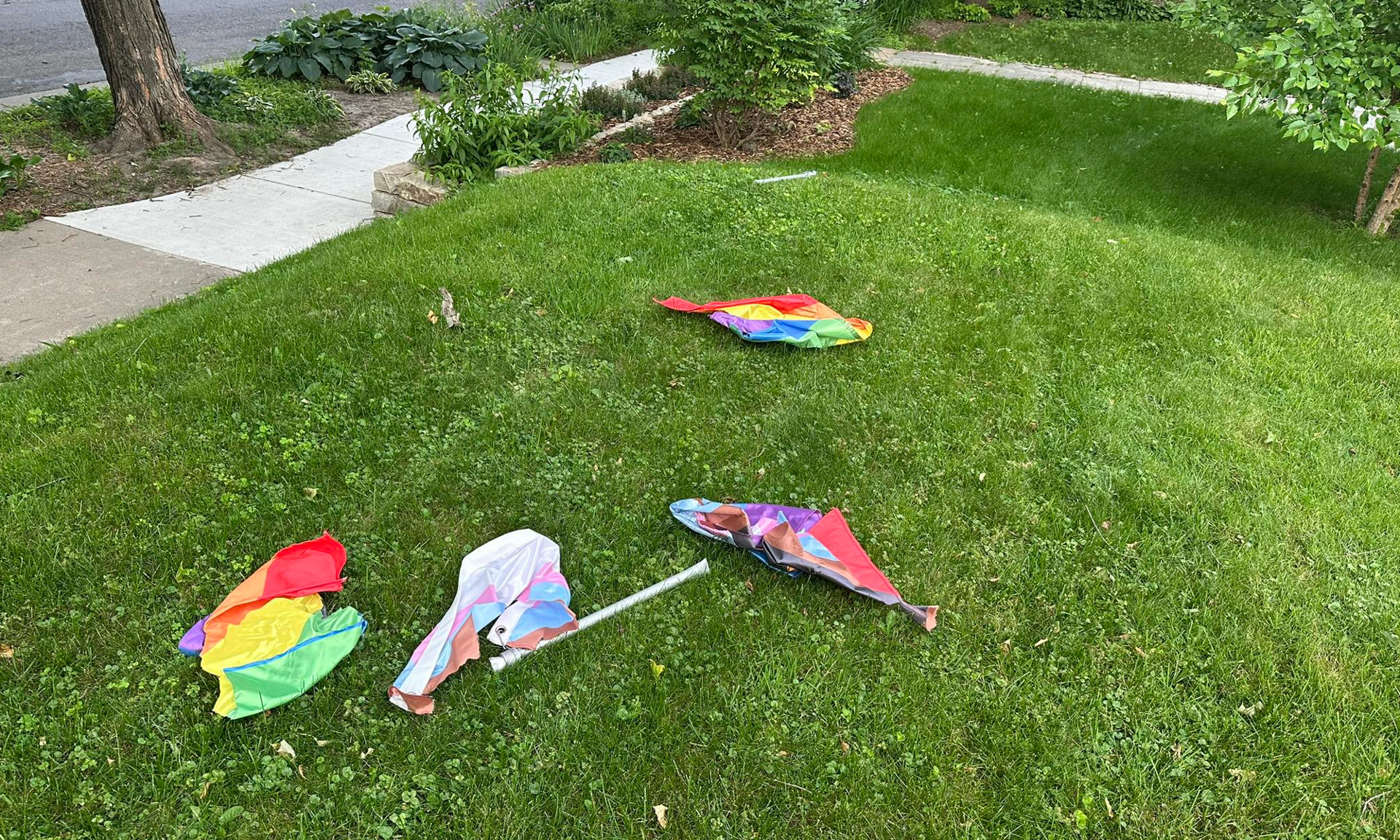 St. Paul neighbors raise money to replace vandalized Pride flags ...