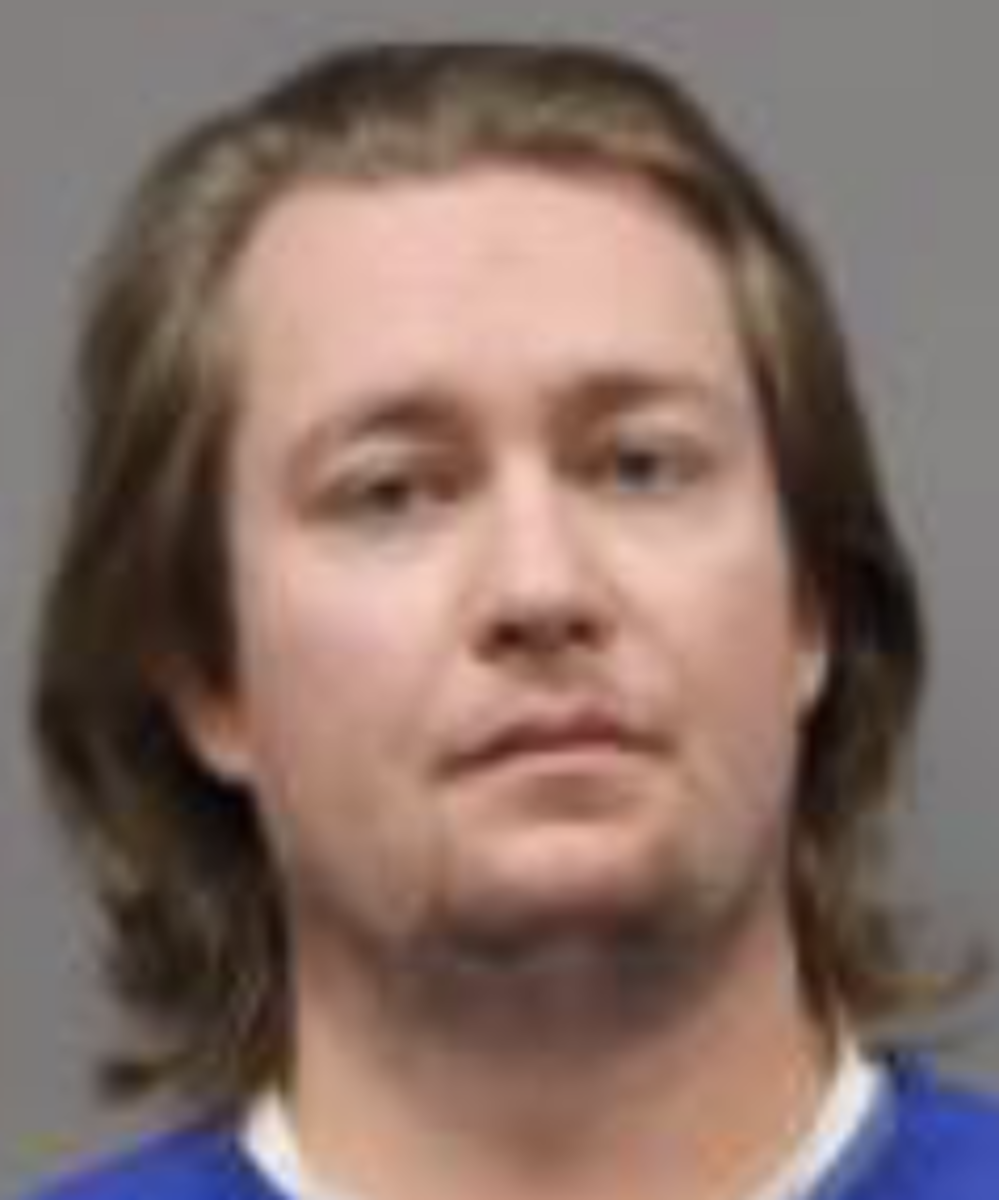 Charges: Cambridge man shot father 'execution style' inside family ...